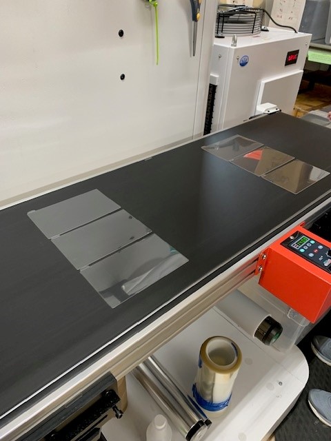 Photodon's new laser cutter fulfills screen protector orders